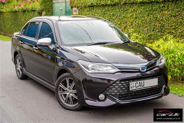 TOYOTA AXIO WXB HYBRID 2017 BORDEAUX PURPLE FOR SALE - Carz.lk