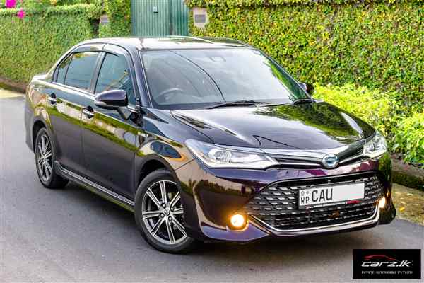 TOYOTA AXIO WXB HYBRID 2017 BORDEAUX PURPLE FOR SALE - Carz.lk